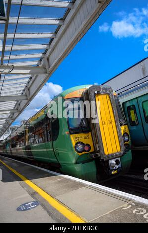 Southern train waiting at Three Bridges railway station, England Stock ...