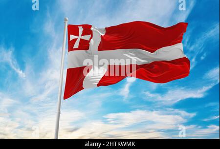 flag of Volhynian region , Ukraine at cloudy sky background on sunset ...