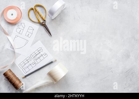Sewing background. Tailor tools dress patterns in workshop Stock Photo ...