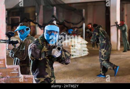 Player in blue mask is targeting in opponent in battlefield in ...