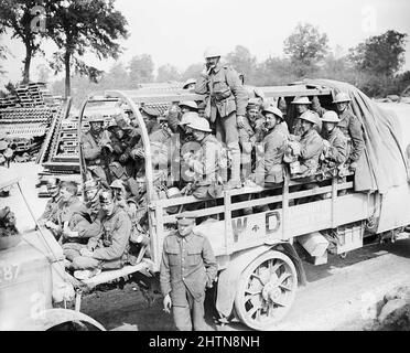 Column of lorries with men of the 16th Irish Division (probably mixture ...