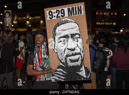 Demonstrators gather to protest the death of George Floyd, a black man ...
