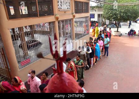 Guwahati, Guwahati, India. 1st Mar, 2022. Hindu devotees queue to offer ...