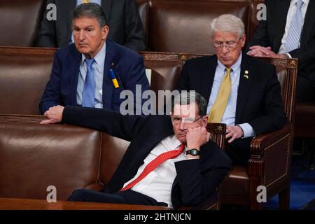 Sen. John Barrasso, R-Wyo., left, listens while Senate Majority Leader ...
