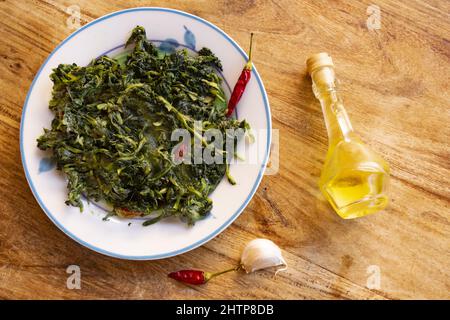 sauteed chicory greens at the roman with oil garlic and hot pepper ...