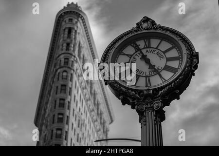 Grayscale shot of an old clock on a windowsill Stock Photo - Alamy