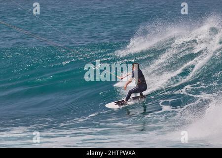 Kite-surfing on Atlantic surf at Ponta Preta, on the southwest coast of ...