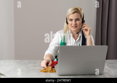 digital translator with uae flag, interpreter working Stock Photo - Alamy