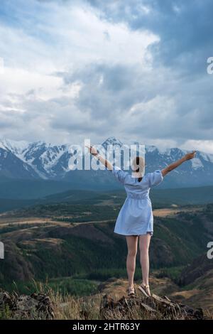 Woman in blue dress in Altai mountain, beauty summer landcape, travel ...