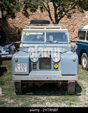 A vertical photo of Land Rover Santana in blue Stock Photo - Alamy