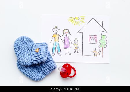 Childs drawing of happy family. Adoption concept Stock Photo - Alamy