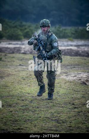 Vertical shot of a dutch soldier in a new uniform and personal ...