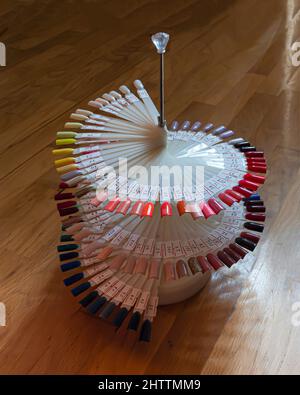 Nail polish samples in different bright colors. Colorful nail lacquer ...