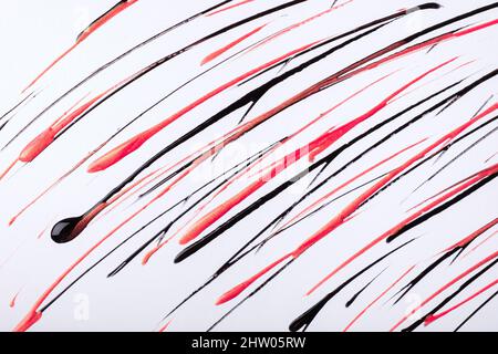 Black and red lines and splashes drawn on white background. Abstract ...