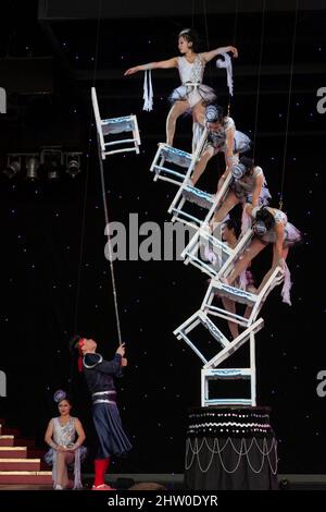 Chinese Women Acrobats Balancing on Bicycle Stock Photo - Alamy