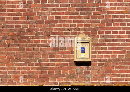 Official french mail boxes on a brick wall Stock Photo - Alamy