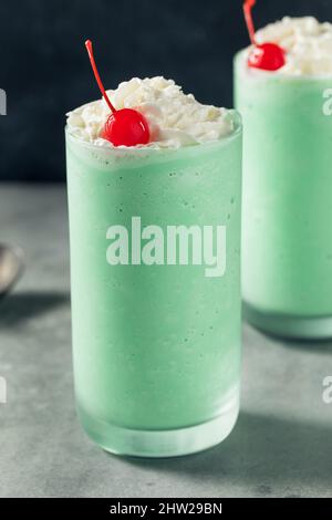 Homemade St Patricks Mint Milkshake with Whipped Cream Stock Photo - Alamy