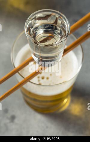Boozy Refreshing Japanese Sake Bomb Cocktail with Beer Stock Photo - Alamy