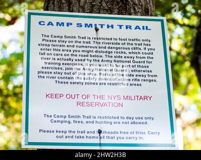 warning sign on trail along military boundary unexploded ordinance keep ...