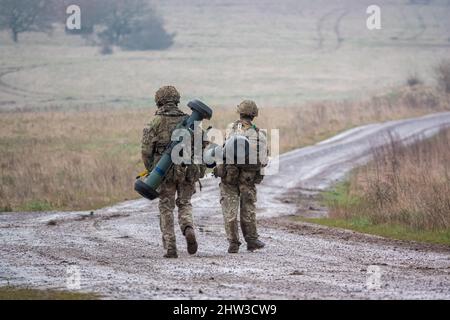 British army soldiers completing an 8 mile combat fitness test tabbing ...