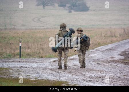 British army soldiers completing an 8 mile combat fitness test tabbing ...