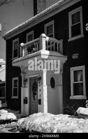 Colonial American house covered with snow Stock Photo - Alamy