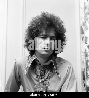 Eric Clapton of Cream shows off his curly hair that is created for him ...
