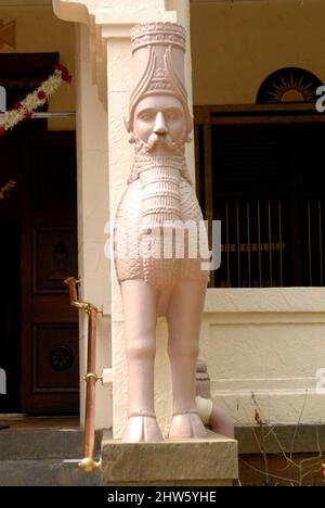 A Lamassu Assyrian protective deity goddess standing in front of a ...