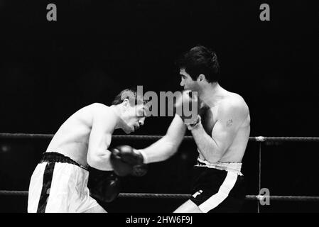Boxing match between Jimmy Tibbs (white shorts) v Franco Macchia, held ...