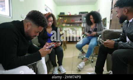 Group of people staring at cellphone devices Family looking at phones ...