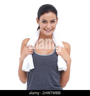 Staying heal. Studio portrait of a fit young brunette woman in workout ...