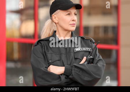 Female security guard outdoors Stock Photo - Alamy