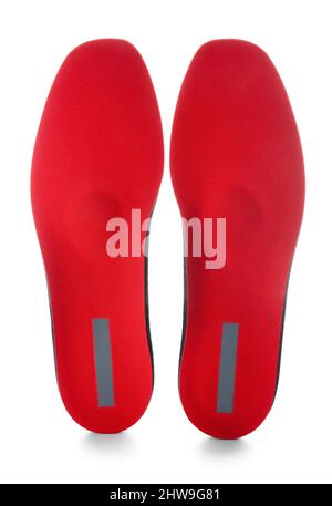 Red orthopedic insoles isolated on white background Stock Photo - Alamy