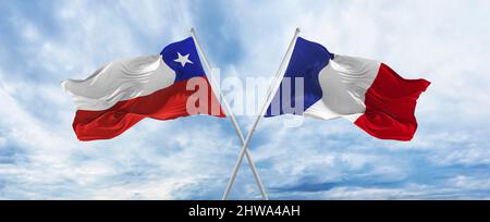 France and Chile two flags on flagpoles and blue cloudy sky Stock Photo ...