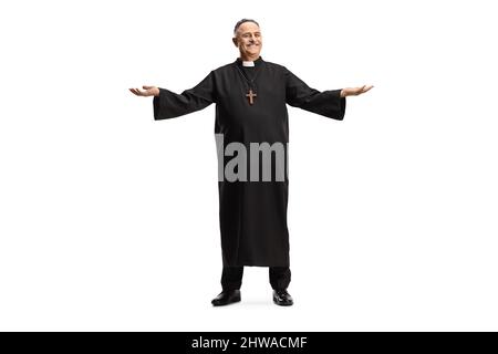 Full length portrait of a priest raising arms towards sky isolated on ...