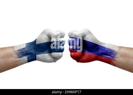 Russia vs Finland concept flags on a wall with a crack. Finland and ...