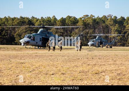 U.S. Navy Corpsman with 2nd MLG, carry a simulated casualty during ...