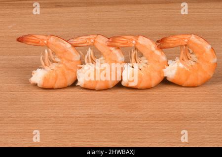 Perfectly retouched shrimp on wood background. High resolution photo ...
