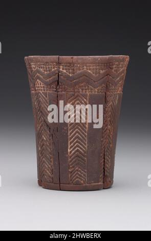 This Kero, a traditional Andean drinking vessel, is an example of ...