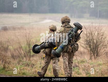 British army soldiers completing an 8 mile combat fitness test tabbing ...