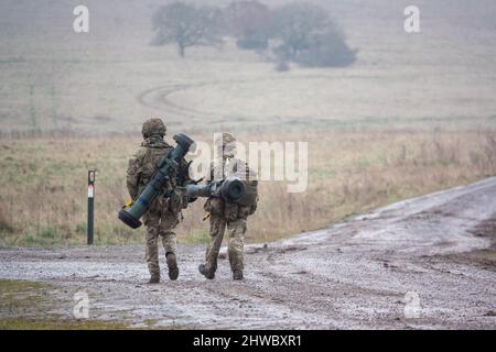 British army soldiers completing an 8 mile combat fitness test tabbing ...