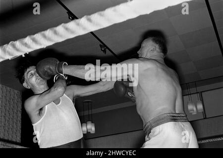 73 years old, and still boxing, Fred Oldham, a Shirley, Birmingham, pig ...