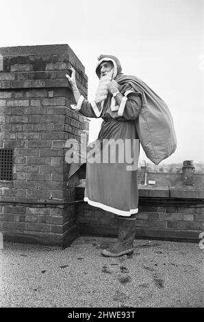 Father Christmas seen here on the roof of Wellsteed department store in ...