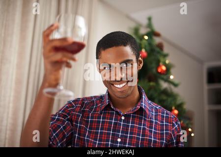 Christmas is my favourite time of year. a handsome young man getting ...