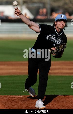 MARCH 05, 2022: UCF Pitcher Connor Staine (#19) delivers a pitch ...