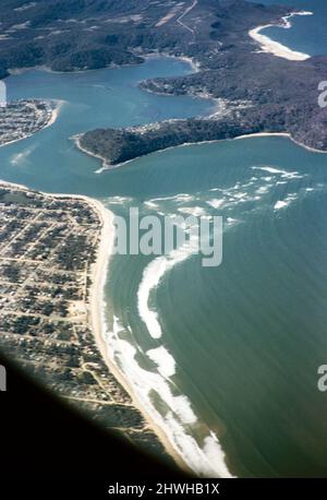 Oblique angle aerial view of coastal plain and sea shoreline, Pacific ...