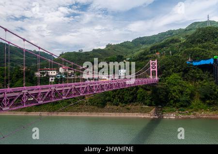 Colorful pink suspension bridge, Fuxing Bridge in Taoyuan Taiwan ...