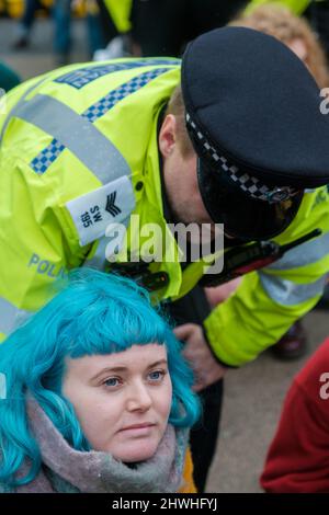 Youth Climate Swarm protest against the use of oil through London ...