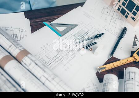 Architect engineer use pen and angle protector drawing design working ...