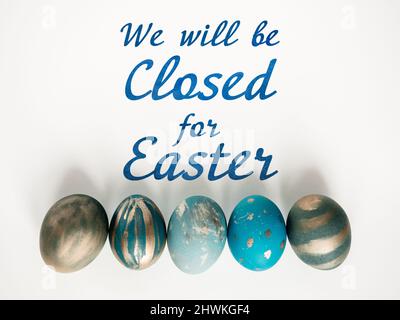 Signboard with the inscription We will be closed for Easter Stock Photo ...